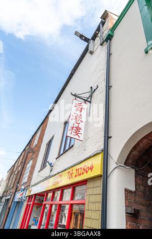 Chinese writing on takeaway restaurant sign Stock Photo - Alamy
