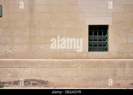 window barred with metal grate Stock Photo - Alamy