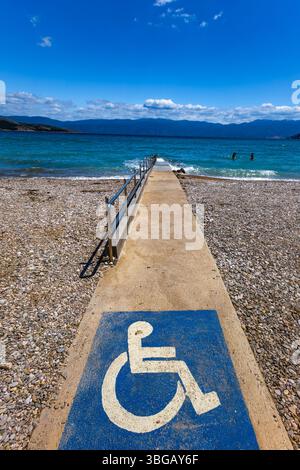 Beach adapted for disabled people moving in wheelchairs, concrete ...