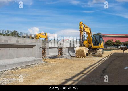 Construction site, Excavators and superstructure (upper part of the ...