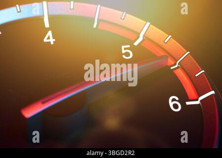 Gauge needle pointing to five on a scale from four to six, with a ...