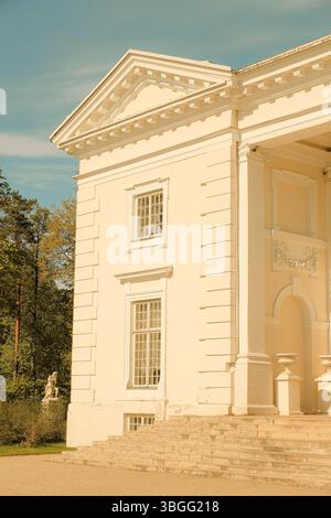 A grand European palace with a symmetrical facade, multiple windows ...