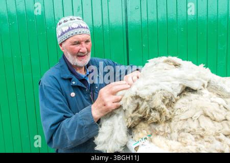 Oliver Henry, master wool grader at Jamieson & Smith in Lerwick ...