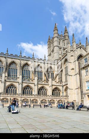 Busker musician performing in Bath Abbey church yard, city of Bath ...