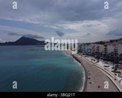 A drone shot of the coastal buildings near to the Bondi sandy beach ...