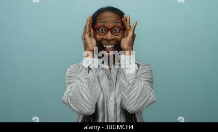 A woman poses with her face showing through a cardboard cutout during ...