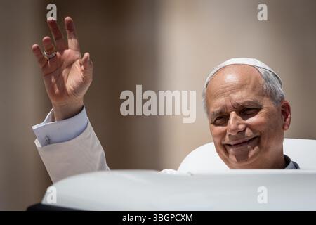 Pope Leo XIV leaves at the end of his weeky general audience in St ...