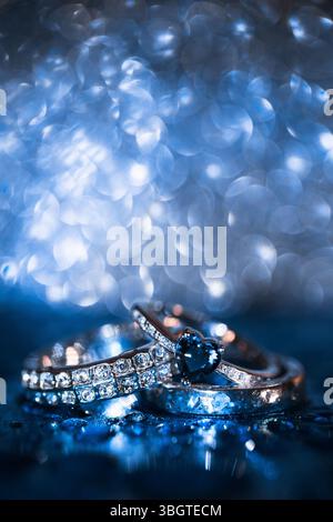Macro photo of wedding rings on oaths Stock Photo - Alamy