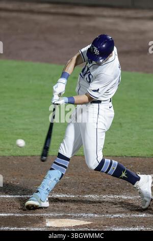 Tampa Bay Rays' Kameron Misner runs to home plate to score on a single ...