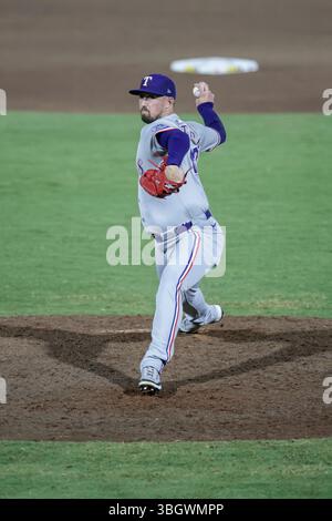 Texas Rangers pitcher Shawn Armstrong throws a pitch to the Baltimore ...