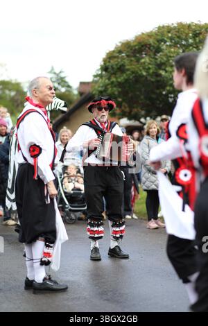 Morris dancers dancing in village street English traditional dance folk ...