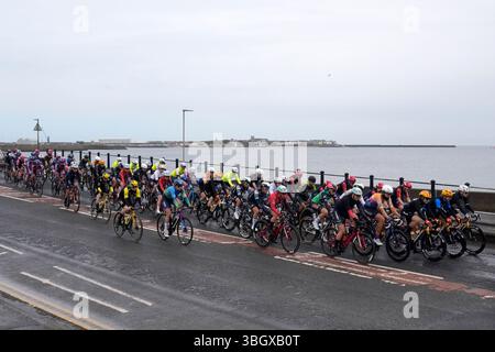 The peloton makes it's way past Hartlepool seafront during stage two of ...