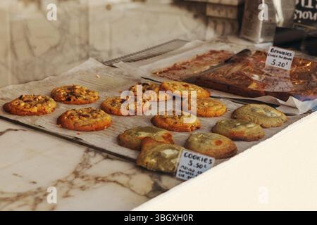 Freshly baked cookies on display at bakery Stock Photo - Alamy