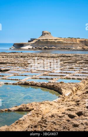 Salt pans of the Cini family in Xwejni Bay, in the background the White ...