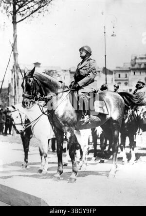"Benito Mussolini (in the tribune on the right) gave a speech to ...