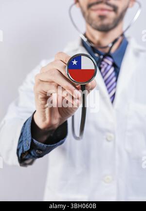 Chile healthcare concept. Male doctor on Chile flag. Doctor with ...