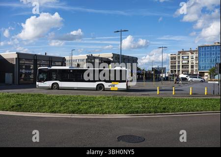 De Lijn bus for regional transport at the rain station of Aalst, East ...