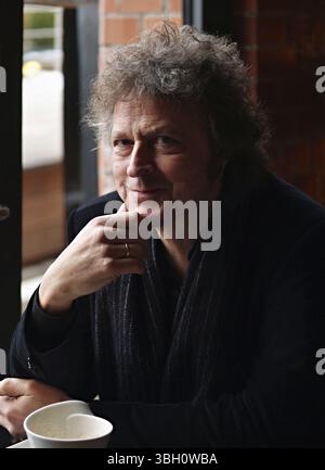 The famous singer and founder of the band BAP in a cafe Stock Photo - Alamy