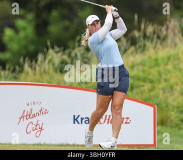 Maja Stark, of Sweden, watches her shot on the 1st green during the ...