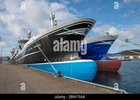 Fishing boats moored around Lerwick Fish Market at Mair's Quay ...