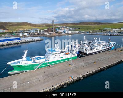 Fishing boats moored around Lerwick Fish Market at Mair's Quay ...