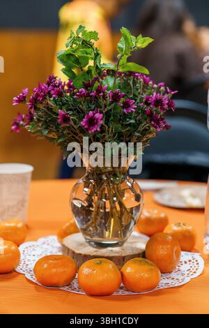 Tangerines on a light purple background. Minimal concept. Fruit flat ...