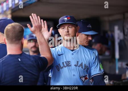 Toronto Blue Jays pitcher Eric Lauer throws a pitch against the Los ...