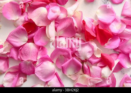 Rose petals on marble background, floral decor and wedding flatlay ...