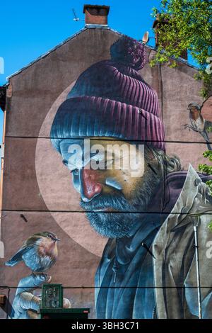 Mural by street artist Smug depicts a modern-day St Mungo on gable end ...