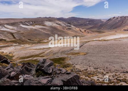 Mountain landscape near the Source of the Amazon river at Mismi volcano ...