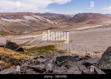 Mountain landscape near the Source of the Amazon river at Mismi volcano ...