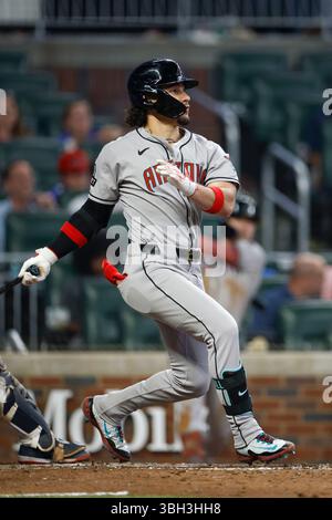 Arizona Diamondbacks' Alek Thomas hits a one-run single during the ...