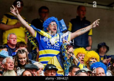 Warrington Wolves fans watch on during the Betfred Challenge Cup Final ...
