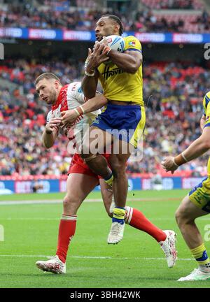 Warrington Wolves' Rodrick Tai (centre) is tackled by Hull Kingston ...