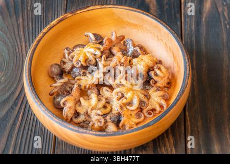 Tender baby octopuses crisped and fragrant, nestled warmly with crunchy ...