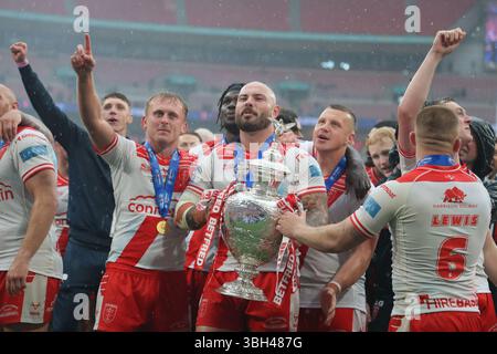 Hull Kingston Rovers' Sam Luckley (centre) is tackled during the ...