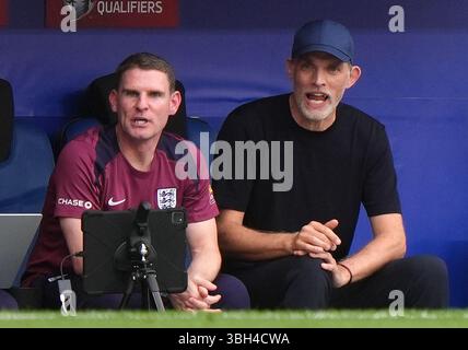 England manager Thomas Tuchel (right) during a training session at St ...