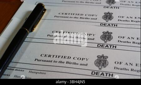 A certified copy of a death certificate issued by the local register ...