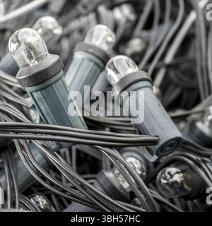 Mess of tangled old-style Christmas lights. Shallow DOF Stock Photo - Alamy