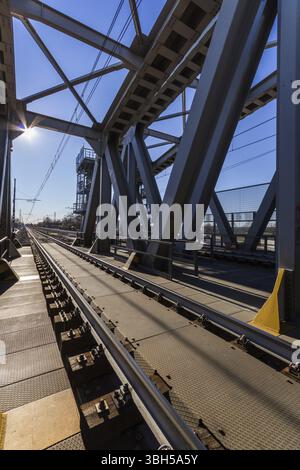 Modern railway steel bridge over highway Stock Photo - Alamy