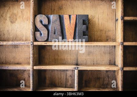 The word SAVE written in vintage letterpress type Stock Photo - Alamy
