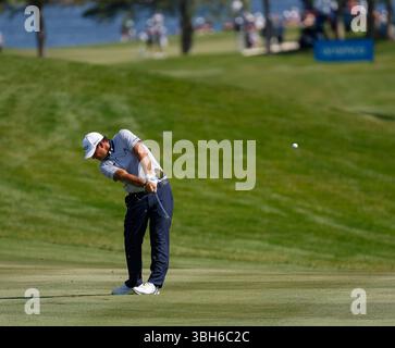 Patrick Reed of 4Aces GC hits his shot from a bunker on the first hole ...