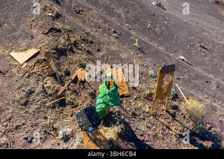 Target practice. High angle view of a mature woman pointing an ...