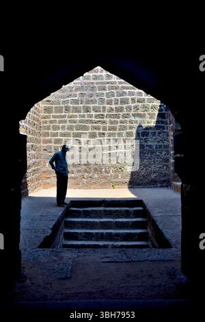 Partial view of the Andhaar Bavdi (the hidden step well), Panhala Fort ...