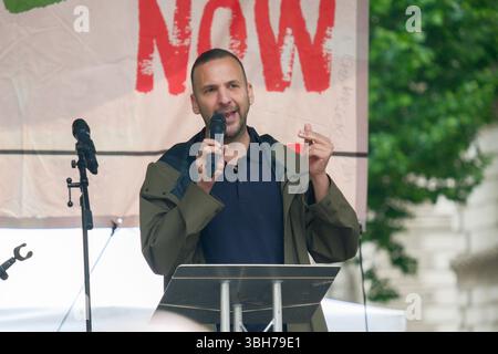 Green Party leader Zack Polanski welcomes his partner Richie Bryan onto ...