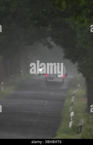 Uckermark GER, Deutschland, 20250608,Uckermark, Landstrasse bei regen ...