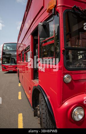 Three Classic Red Double Decker Buses and Big Ben Stock Photo - Alamy