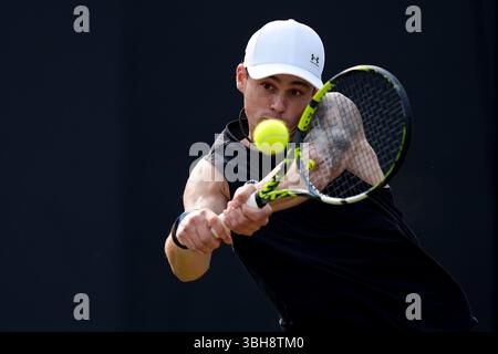 Colton Smith in action during his match against Lloyd Harris on day ...