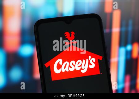 In this photo illustration, the Casey's Retail Company logo is ...