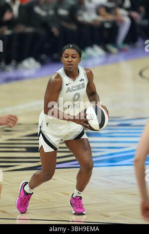 Las Vegas Aces guard Jackie Young celebrates during a rally to ...